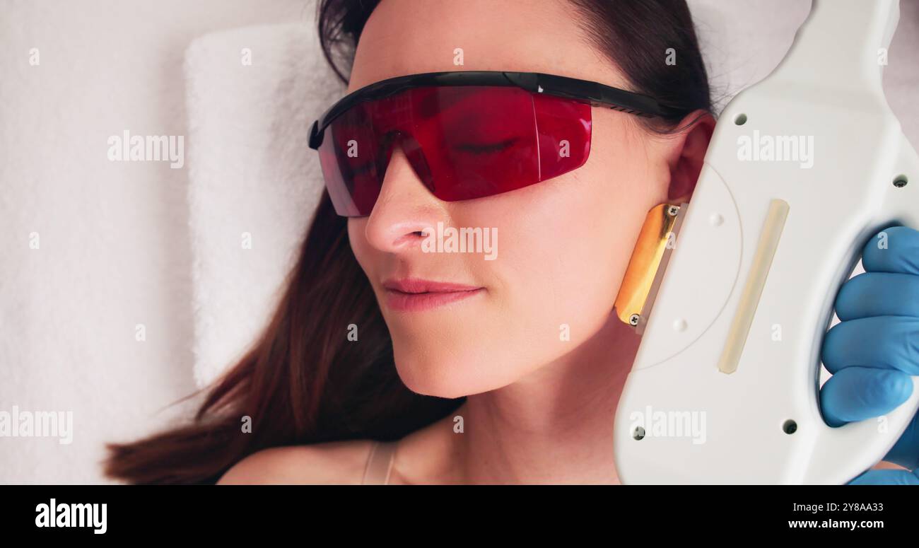 Beautician Giving Laser Epilation Treatment To Young Man Face Stock ...