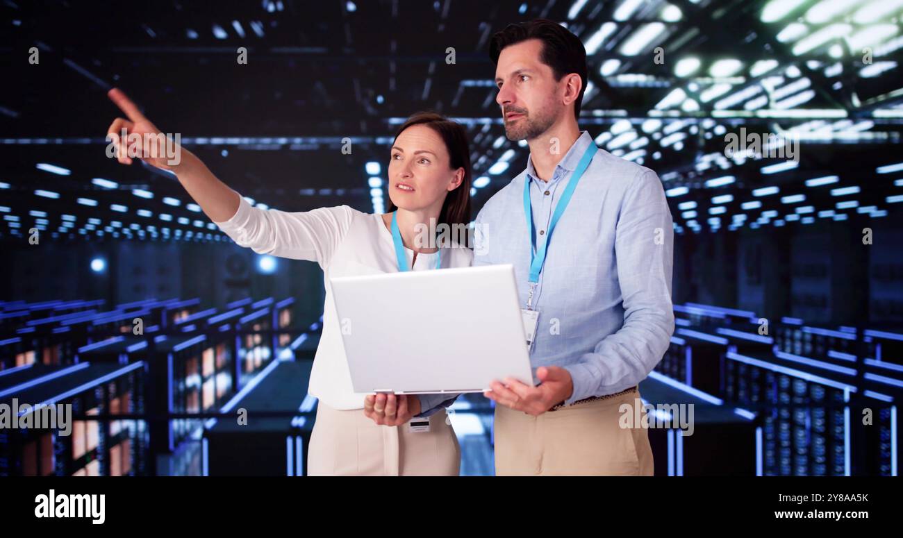 Server Room In Data Center. Cloud Computer Engineers Configuring AI Technology Stock Photo - Alamy
