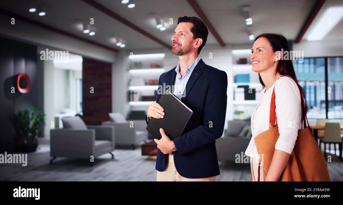 Real Estate Agent Showing House To Woman. Realtor Selling Home Stock ...