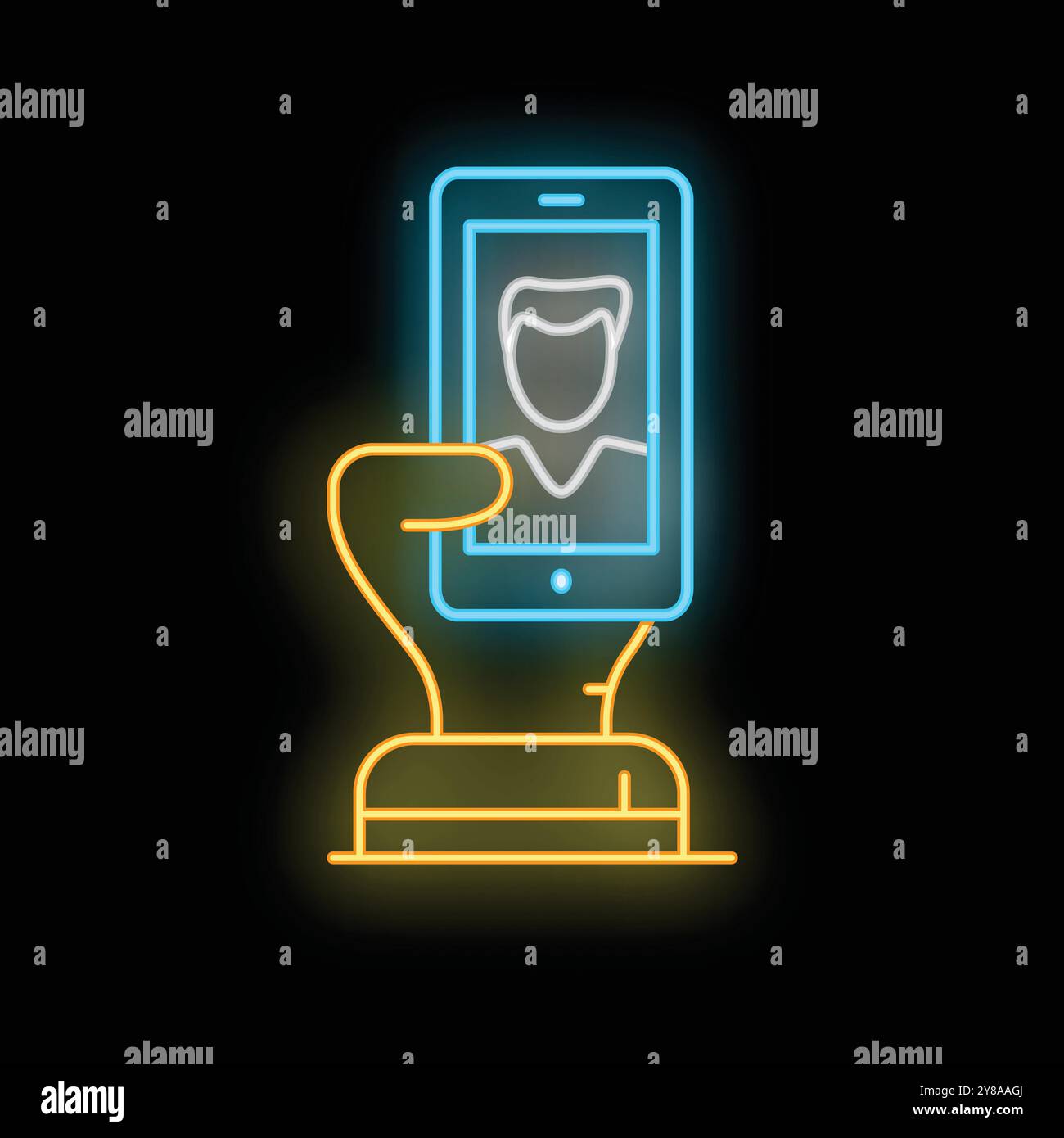 Neon sign representing a hand holding a smartphone showing a user ...
