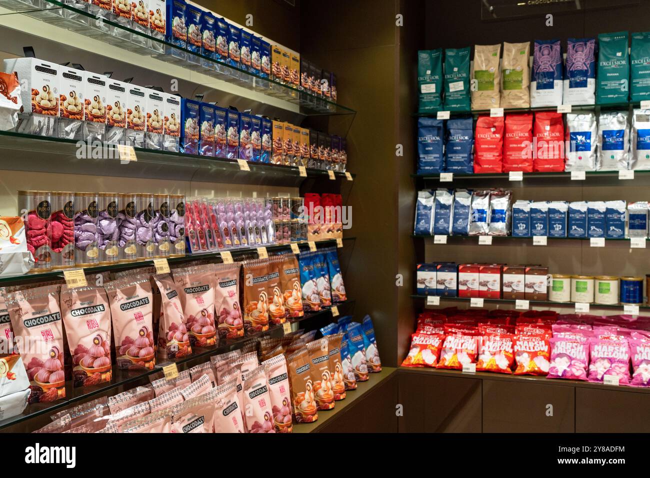 Interior of the candy store. Chocolate, candies, sweets of various ...