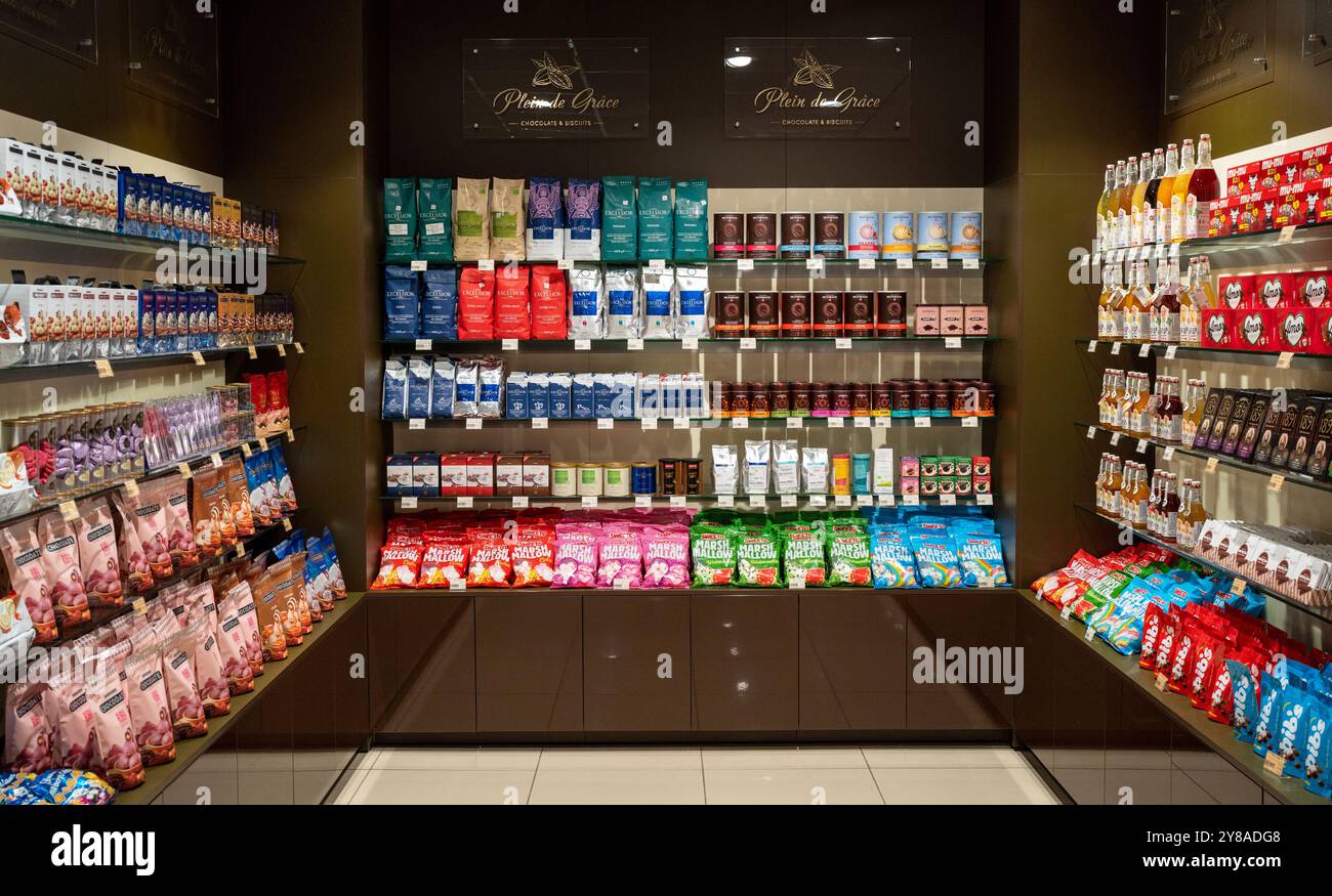 Interior of the candy store. Chocolate, candies, sweets of various ...