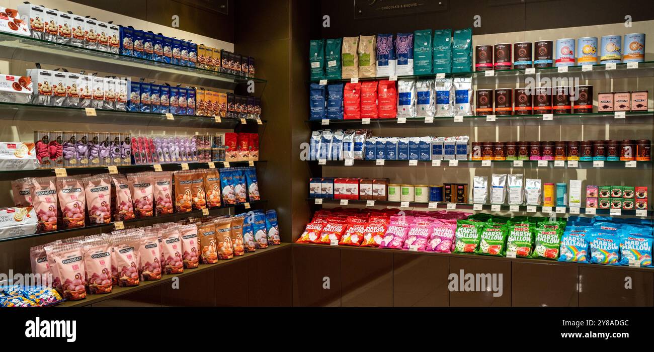 Interior of the candy store. Chocolate, candies, sweets of various ...