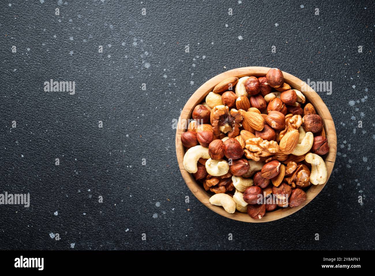 Nuts assortment at black background Stock Photo - Alamy