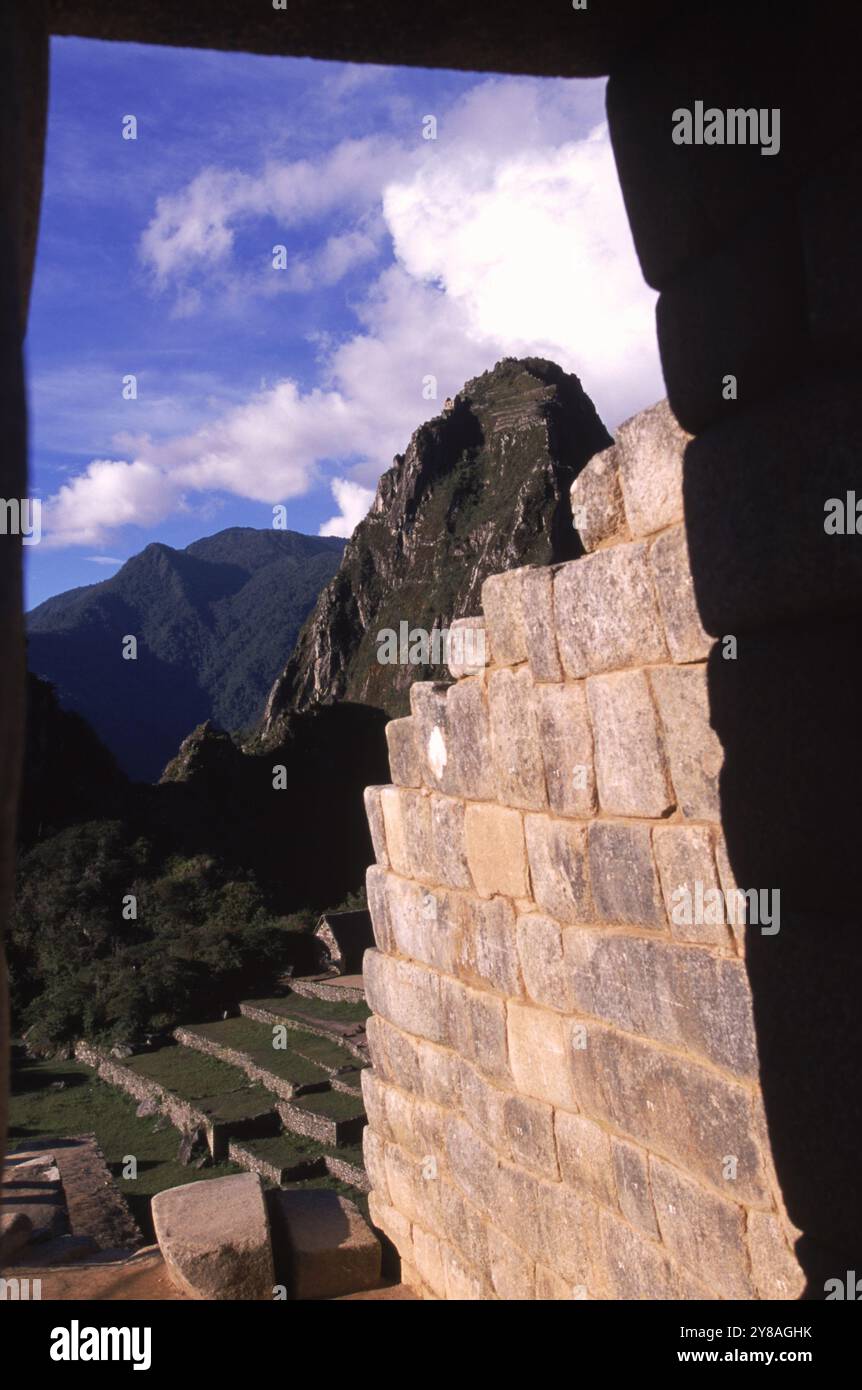 A scenic view of mountains and clouds as seen from the cave, Peru ...