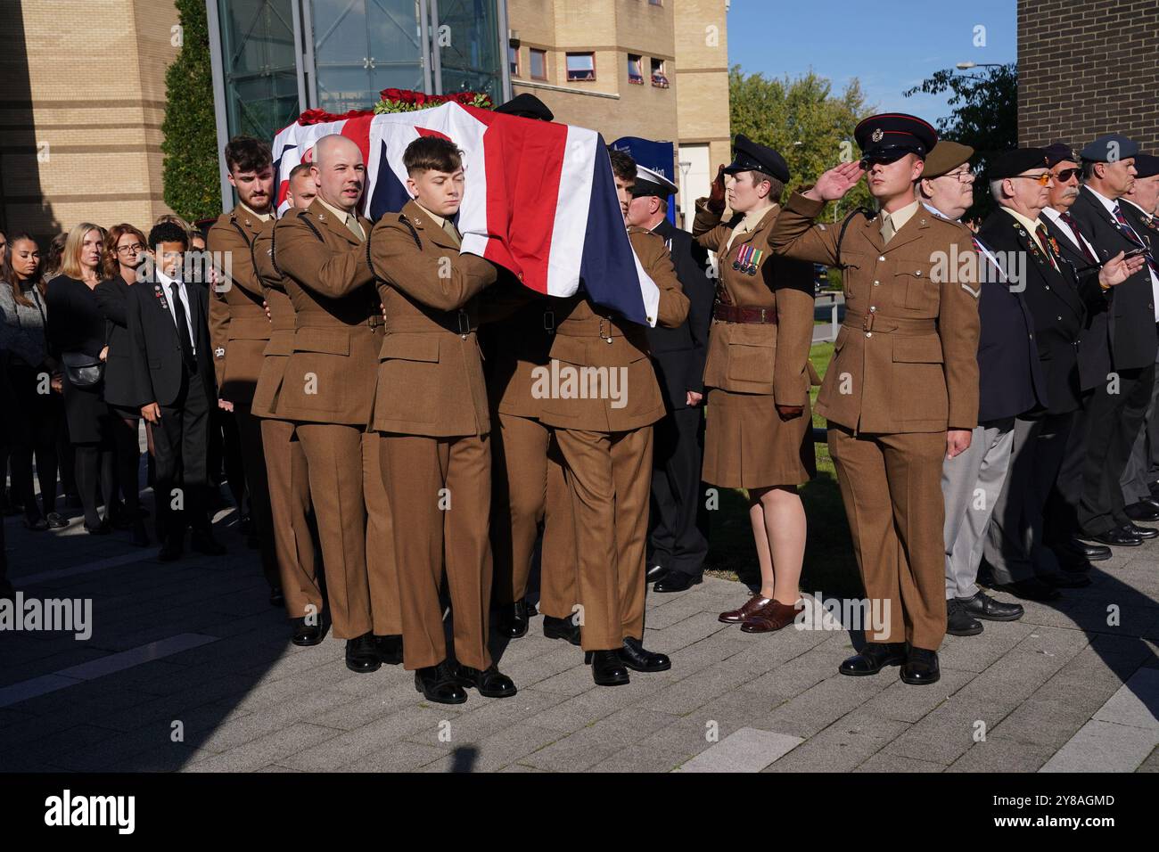 The coffin of 104-year-old D-Day veteran Don Sheppard is carried into ...
