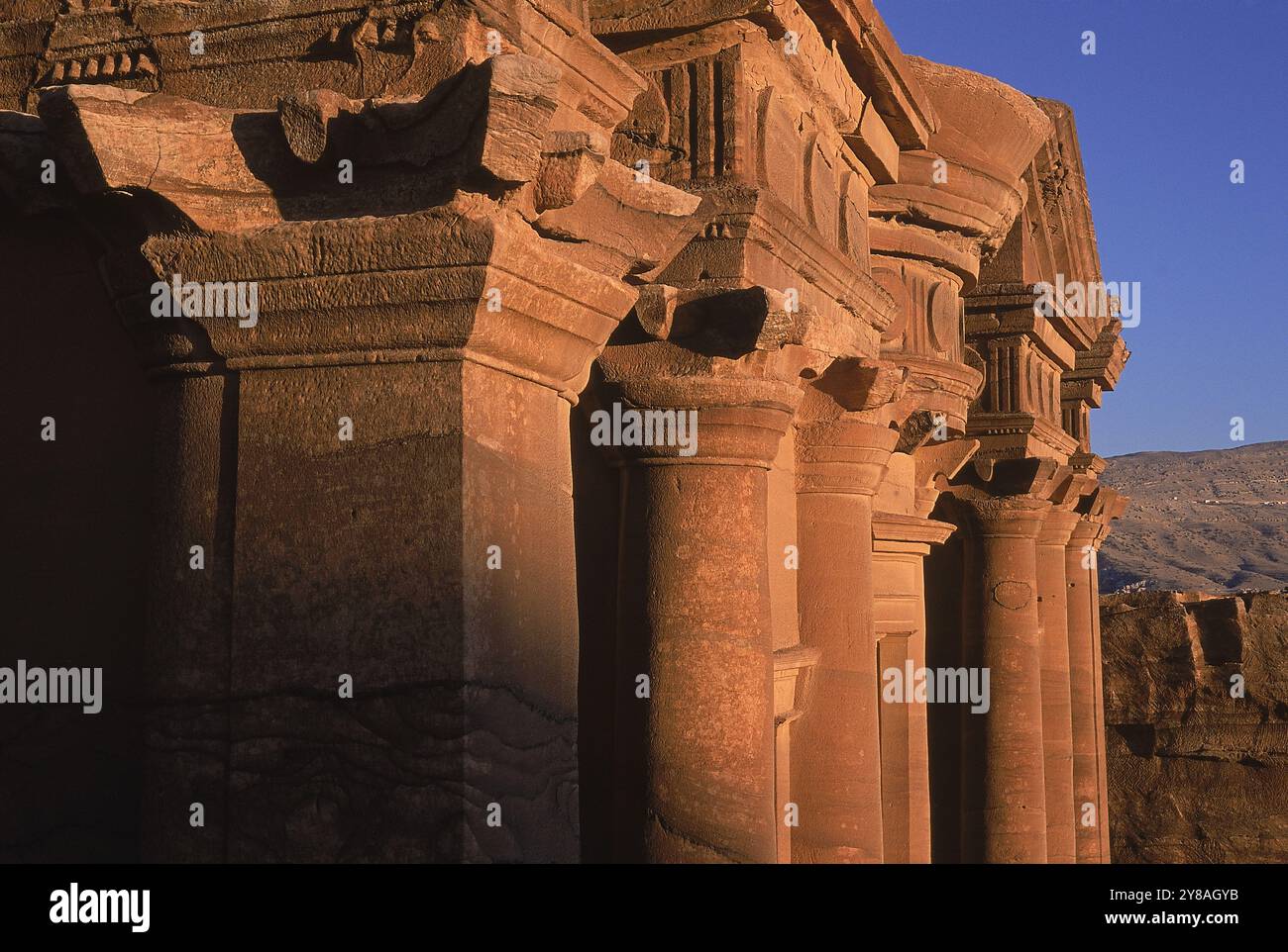 Petra Monastery-- On top of carved tower of the Monastery with Bedouin ...