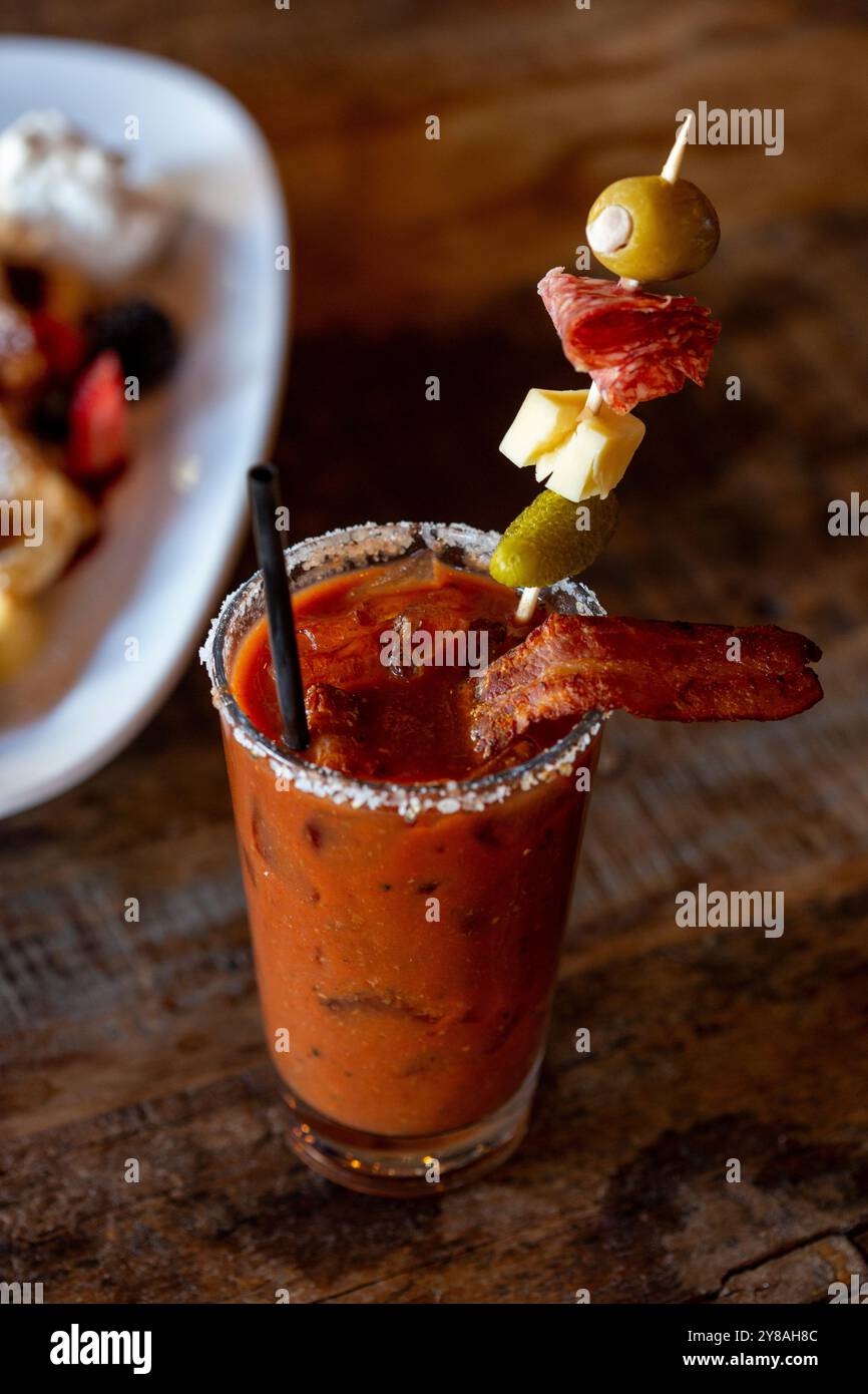 A loaded bloody Mary cocktail in a salted glass Stock Photo - Alamy