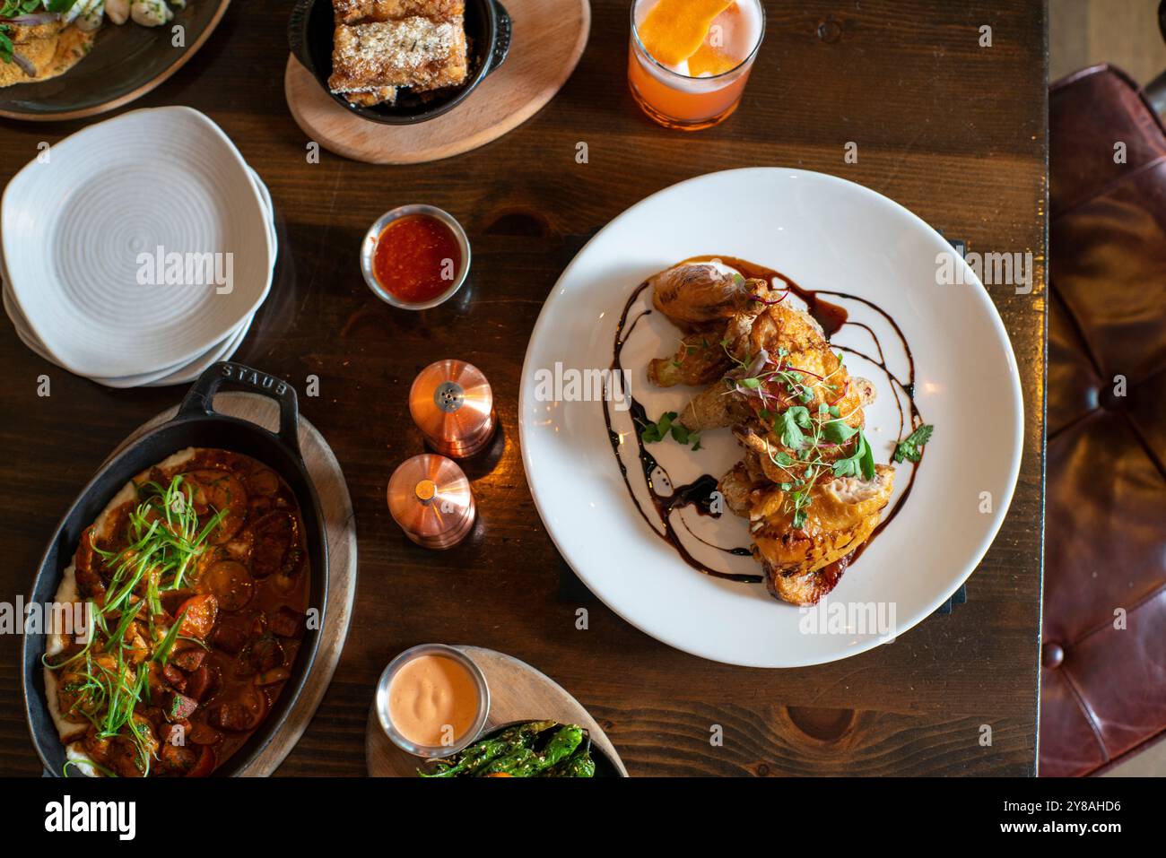 Overhead view of chicken dinner on table Stock Photo - Alamy