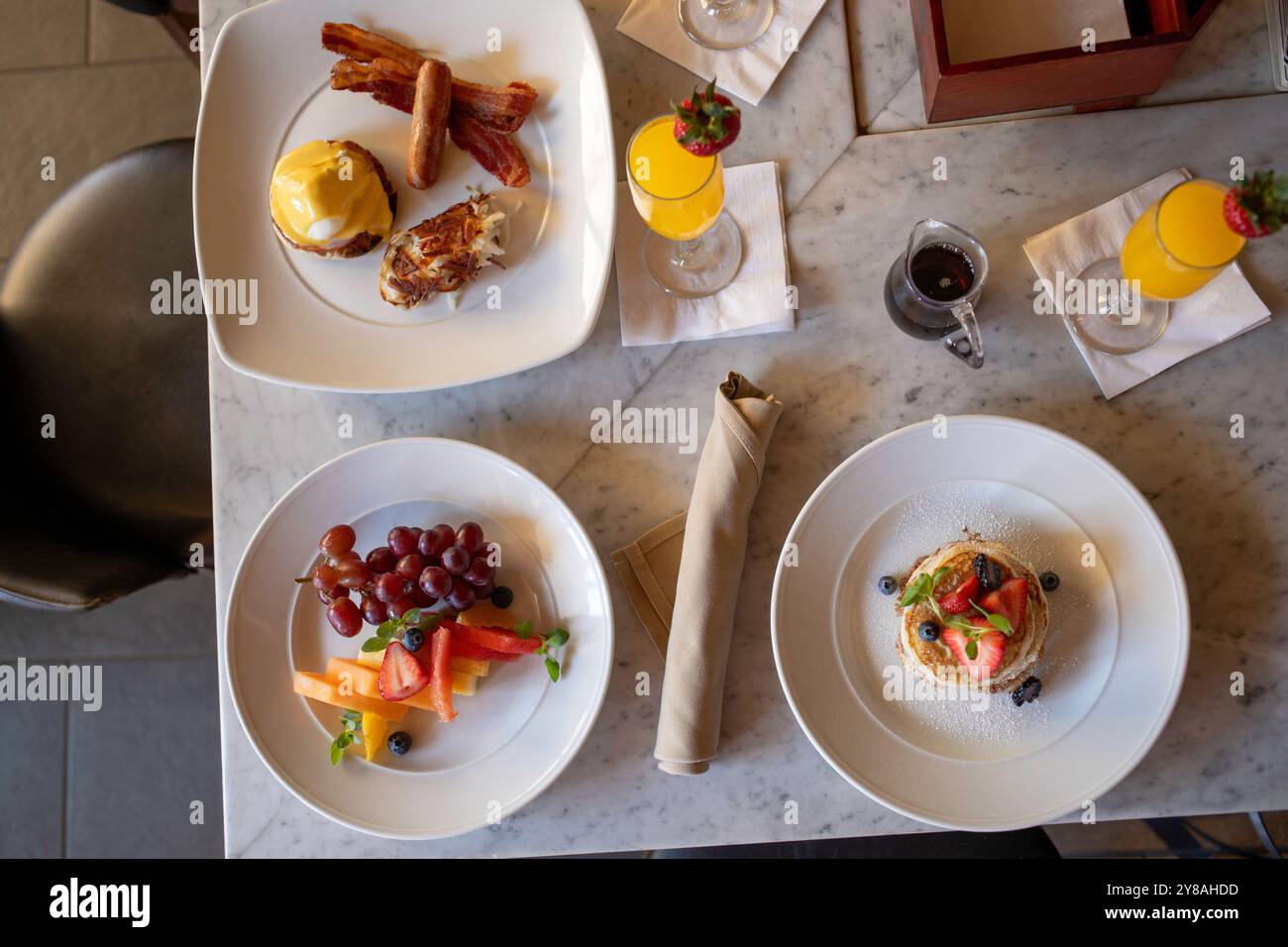 Colorful variety of breakfast foods on table from above Stock Photo - Alamy
