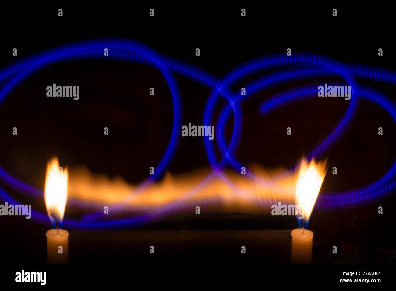 Low shutter speed one candle Stock Photo - Alamy