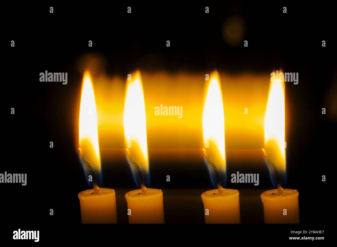 Low shutter speed one candle Stock Photo - Alamy