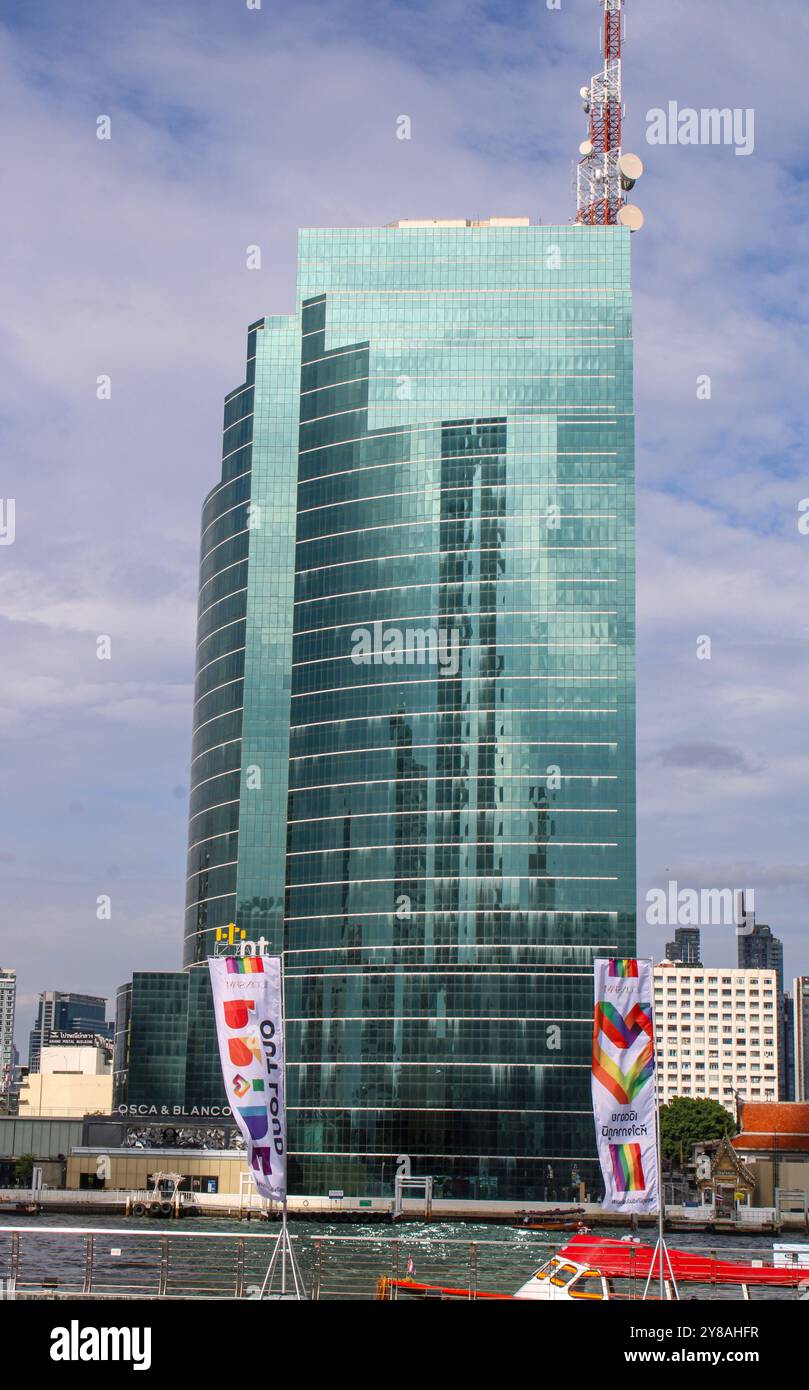 Bangkok. A modern skyscraper in the Thai capital seen from the Chao ...