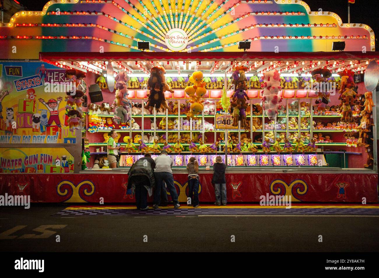 County fair carnival game prizes stuffed animals hi-res stock ...