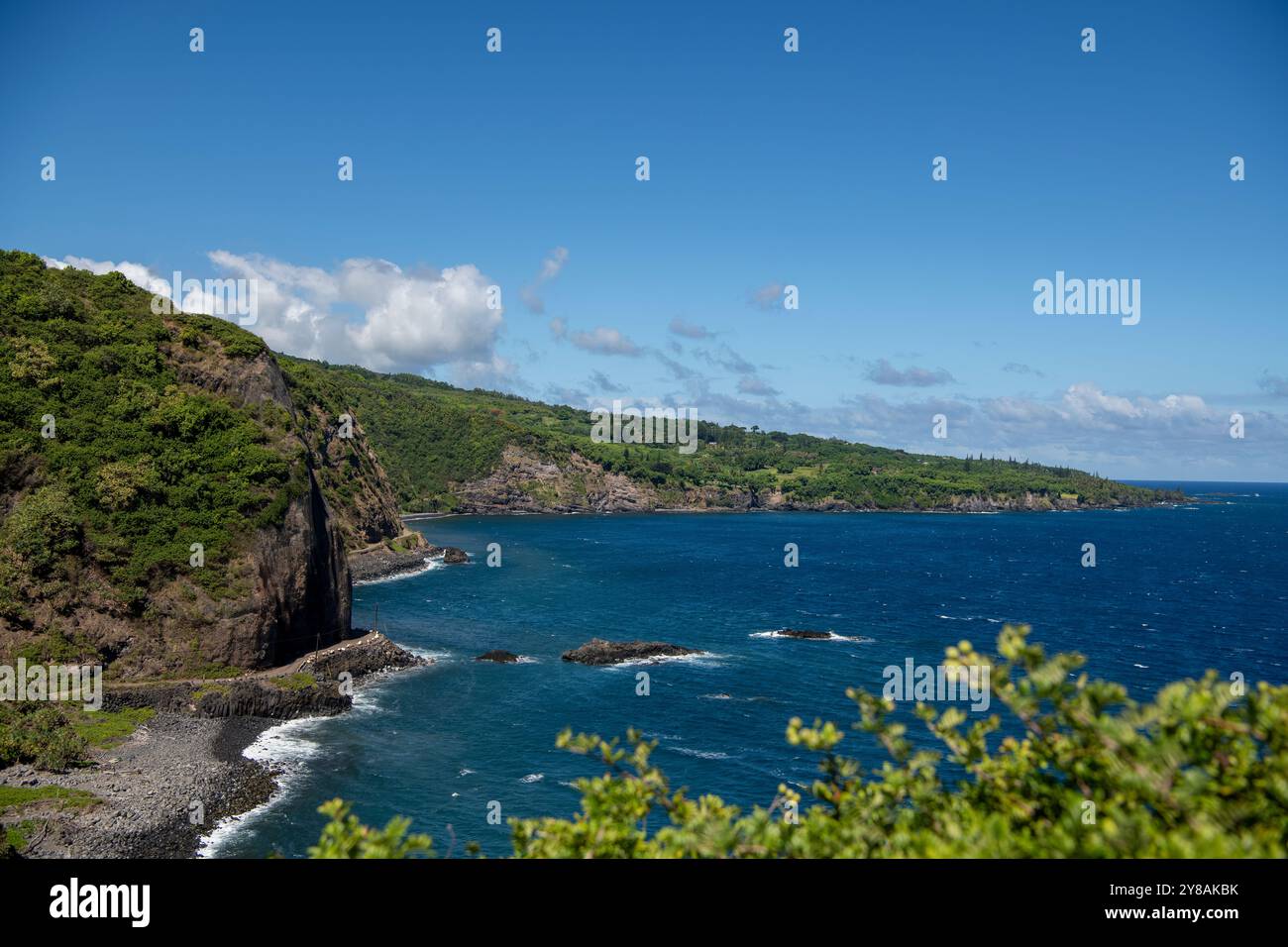 View of east coast cliffs, shoreline and ocean north of Hana Maui Stock ...