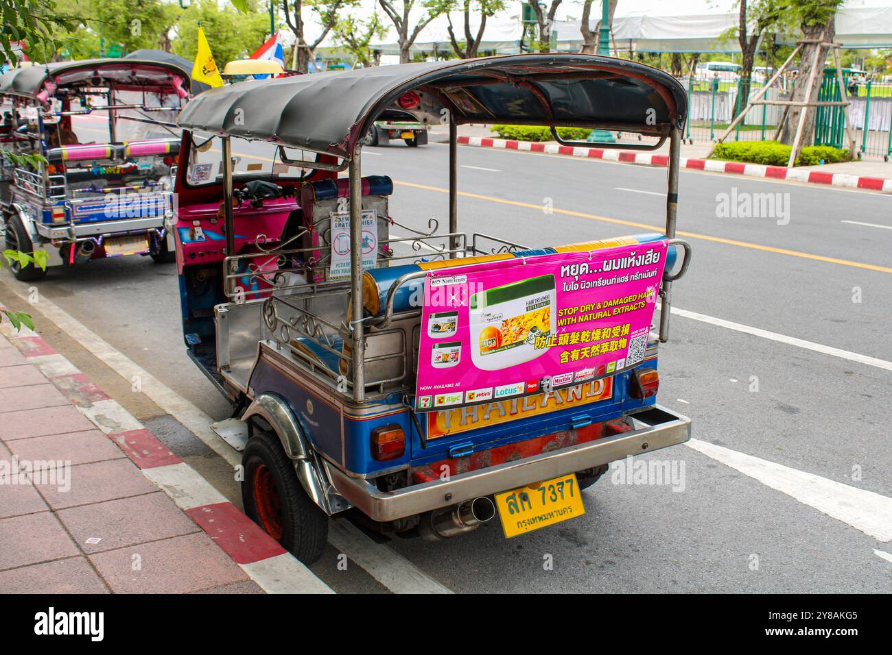 Bangkok. A tuk tuk on the streets of the Thai capital. This picturesque three-wheeled taxi, also ...