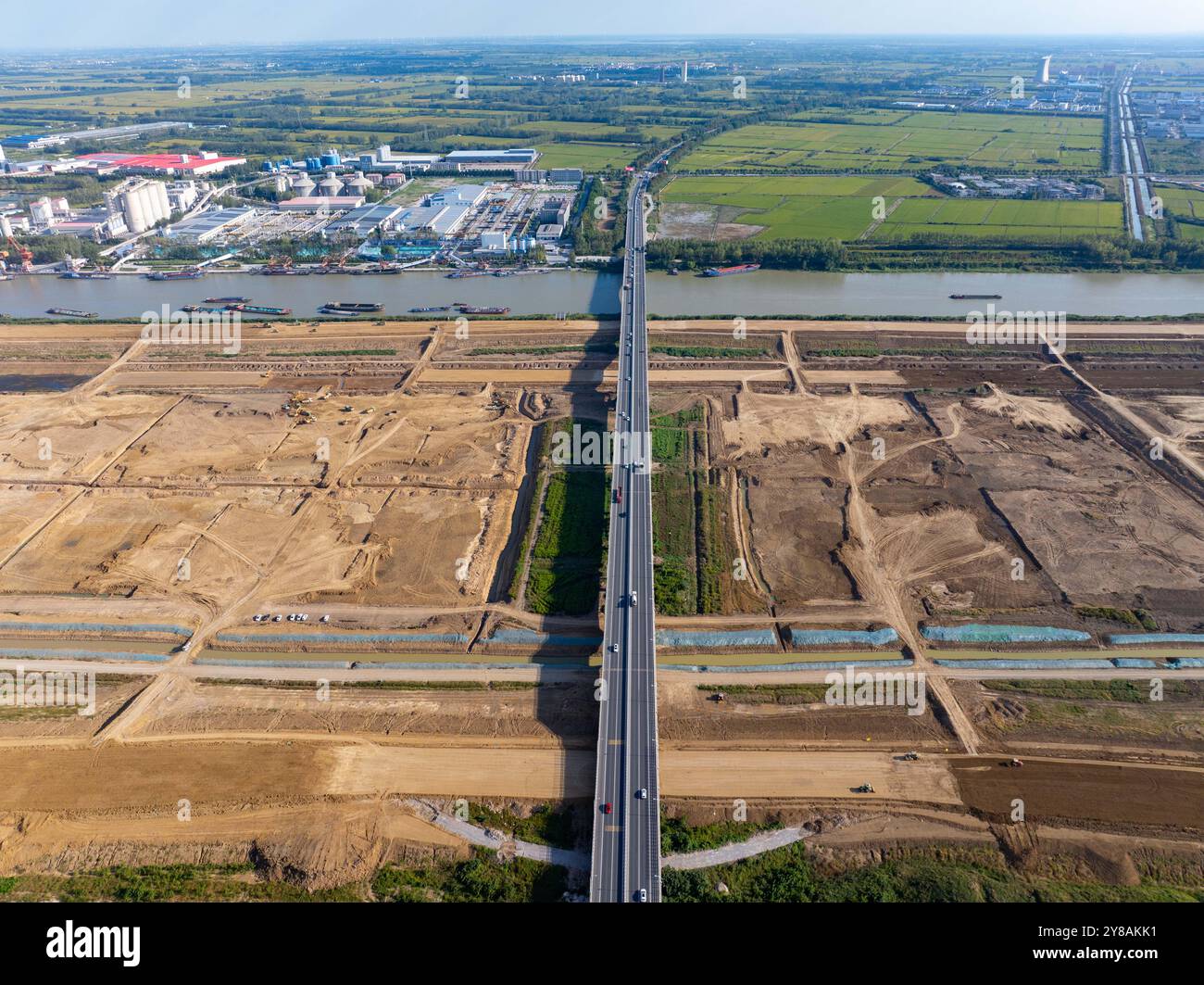 HUAI'AN, CHINA - OCTOBER 4, 2024 - Workers operate machinery at the ...