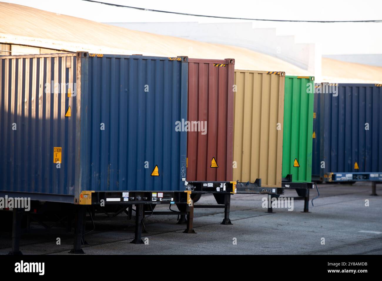 multi colored shipping containers parked on trailers Port of LA Stock ...