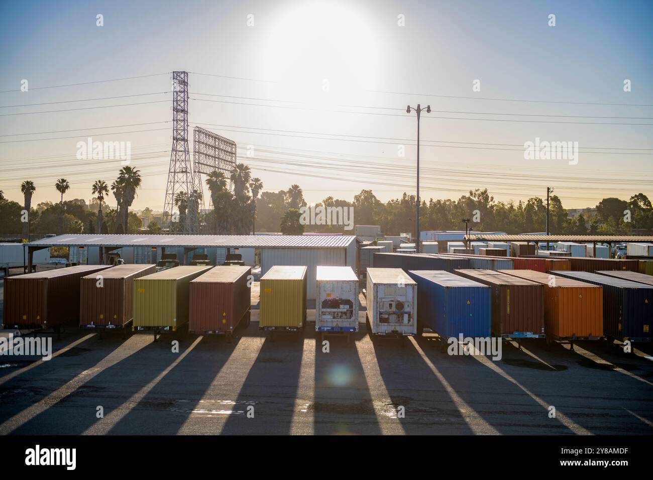 Row of shipping containers on trailers early morning Port of LA Stock ...