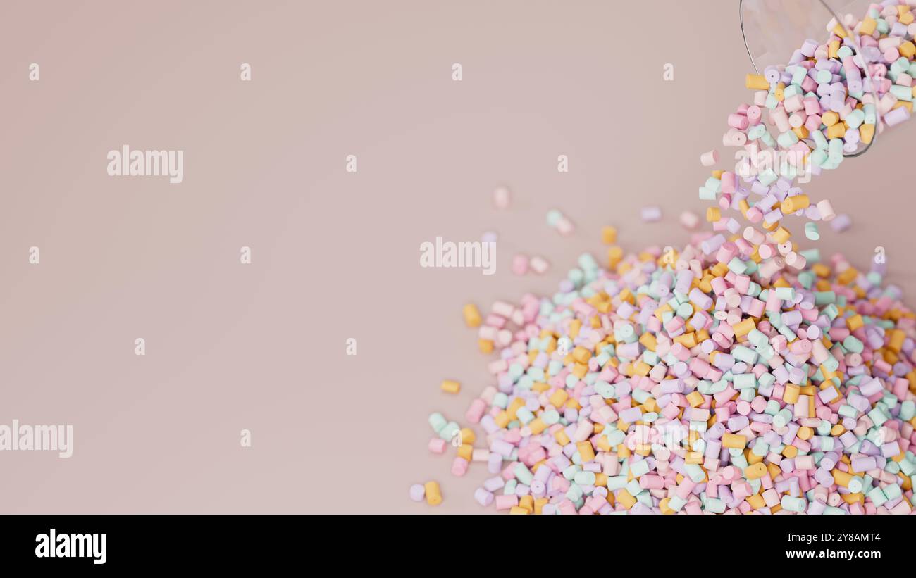 Top view of colorful pastel plastic polypropylene granules pouring from ...
