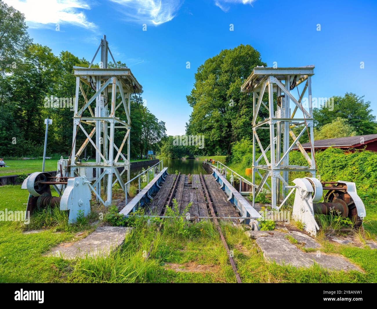 landing stage of the historic railroad ferry with overgrown rails on ...