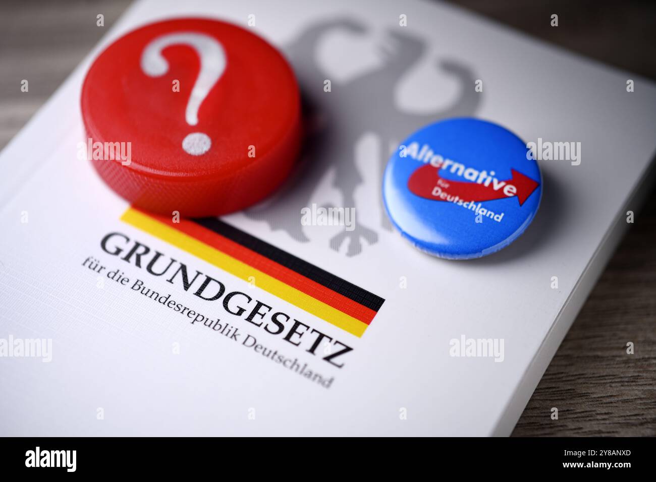 AfD party badge and question mark on the German constitution, symbolic ...