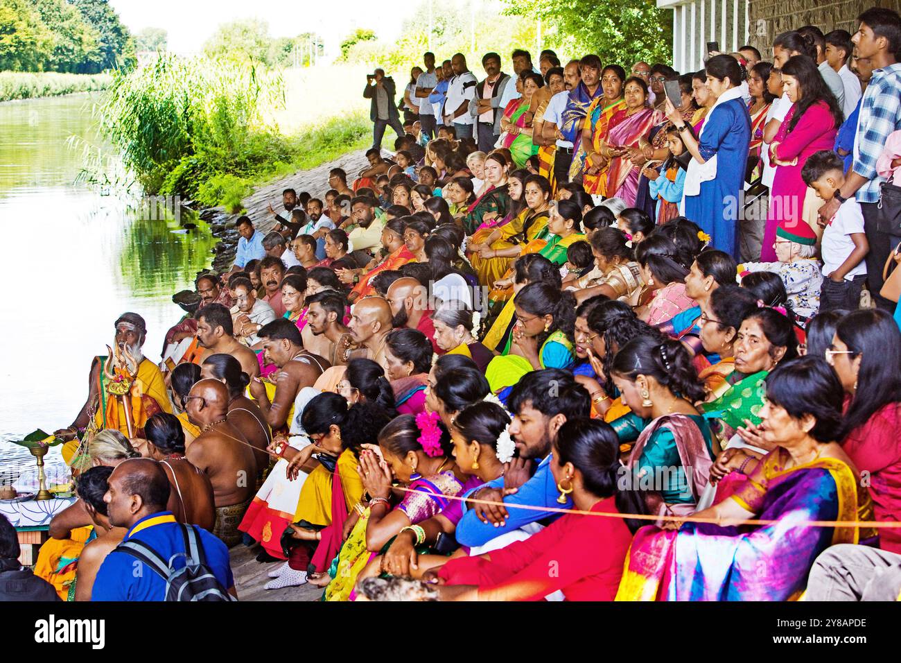 Hindus under the highway bridge of A2 at and in the Datteln-Hamm Canal ...