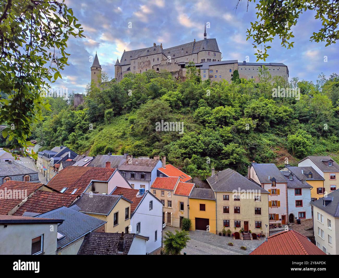 Vianden Castle, the hilltop castle towers above the town Vianden ...