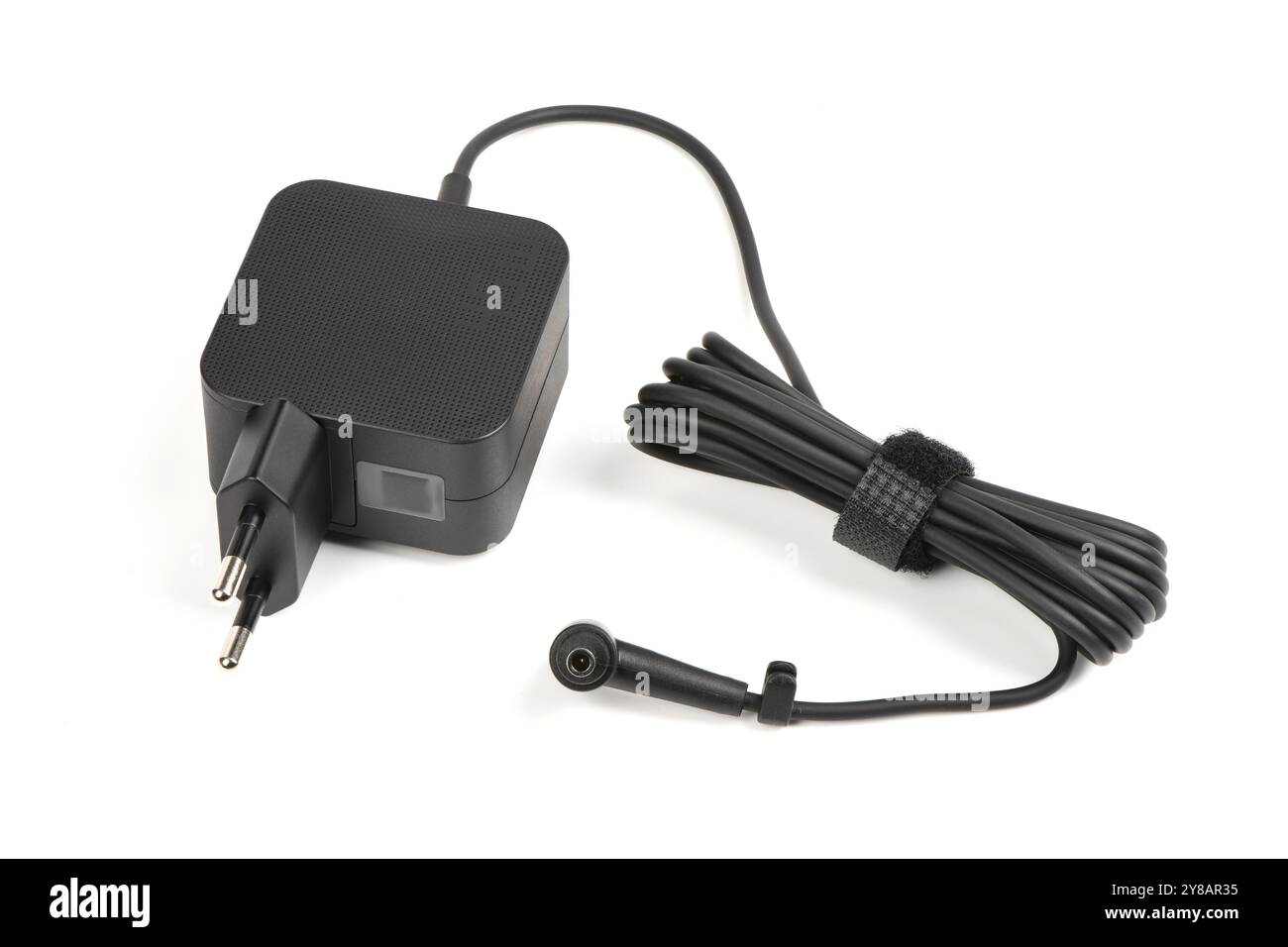 Laptop power supply. Laptop AC adapter isolated on white background ...