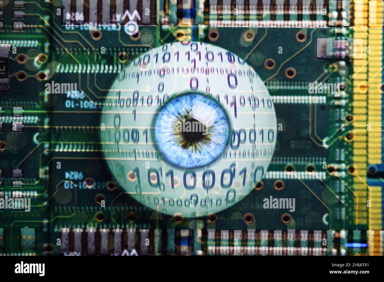 PHOTO MONTAGE, Artificial eye with binary code lies on computer board, symbolic photo artificial ...