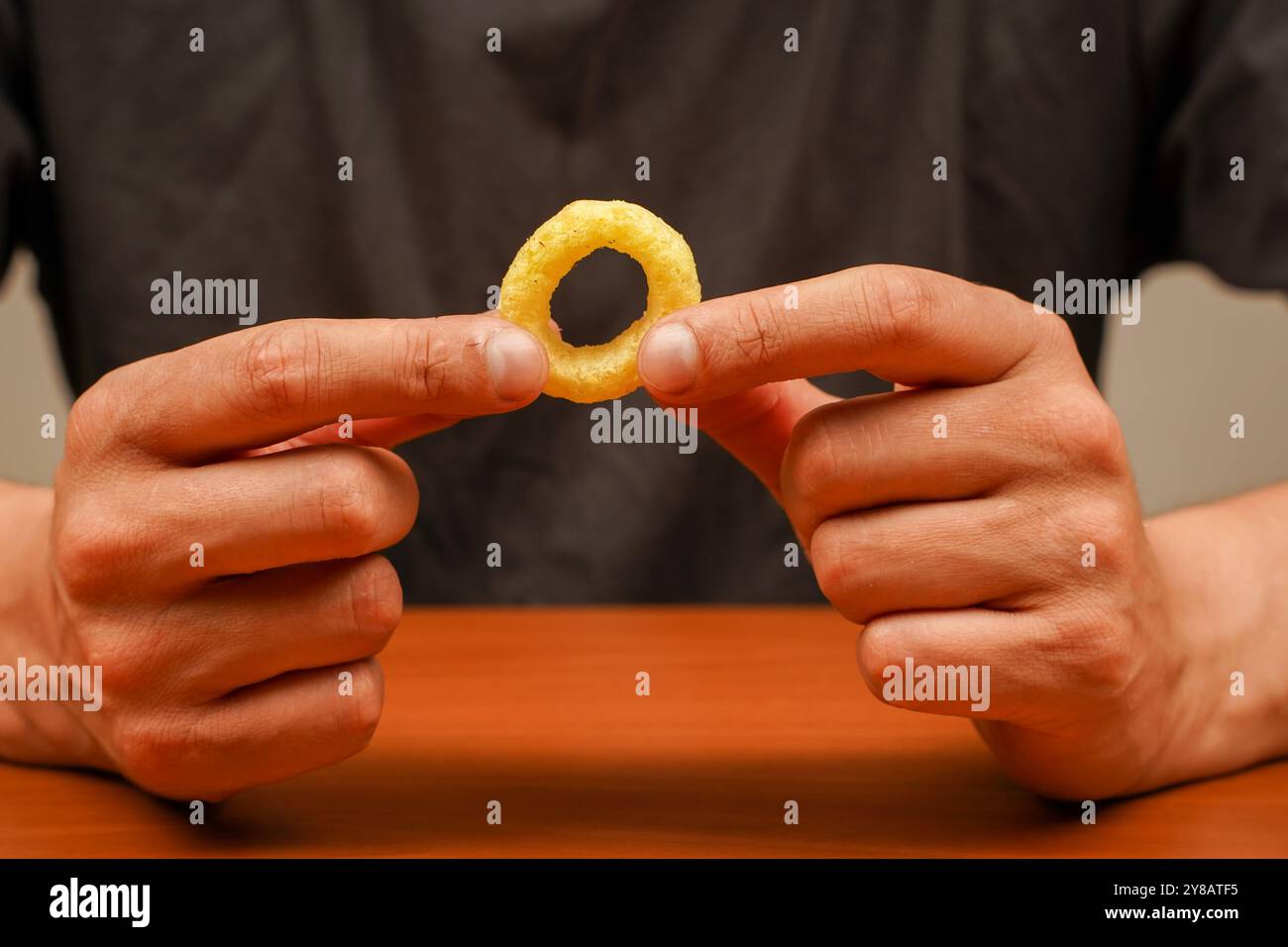 Junk food. Cooked tasty appetizer meal. Fried rings. Corn onion rings ...