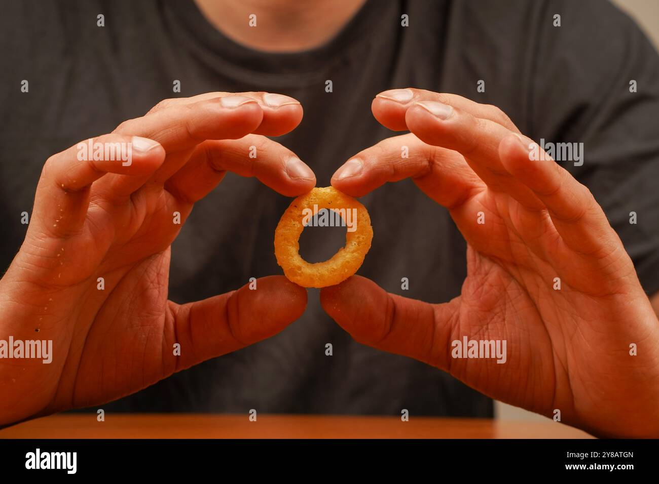 Cooked tasty appetizer meal. Fried rings. Corn onion rings. Unhealthy ...