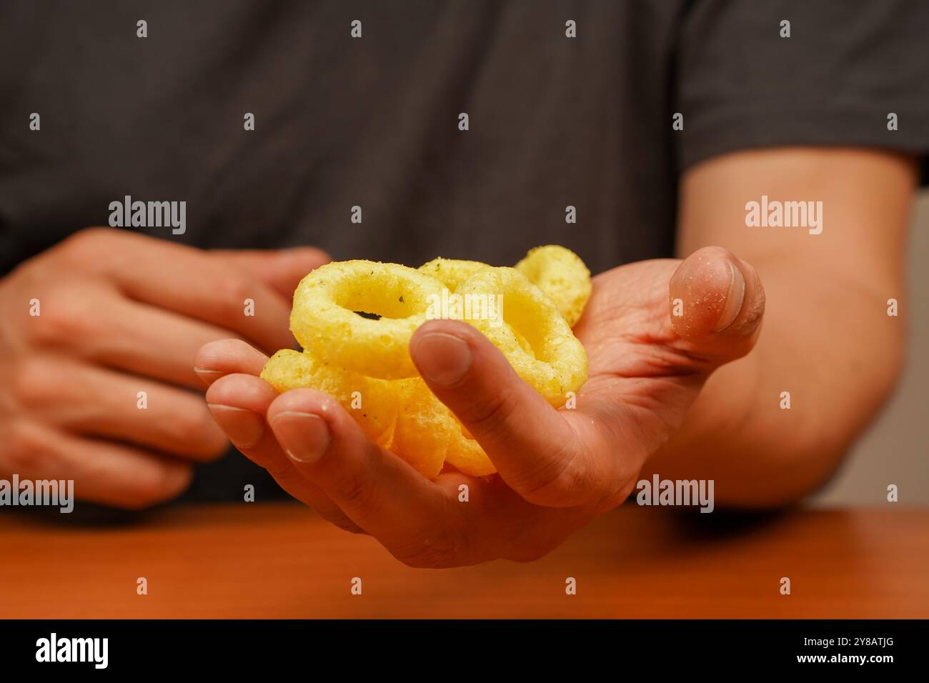 Cooked tasty appetizer meal. Fried rings. Corn onion rings. Unhealthy ...
