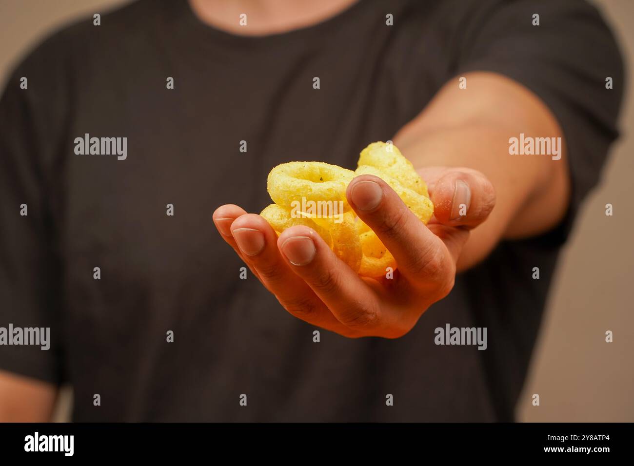 Junk food. Cooked tasty appetizer meal. Fried rings. Corn onion rings ...
