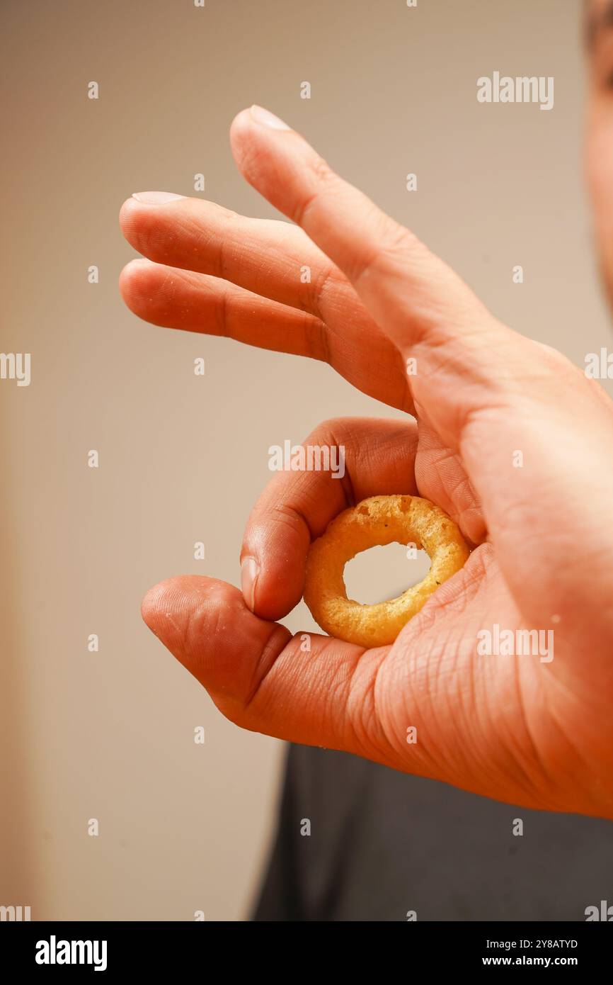 Okay sign. Appetizer meal. Eating onion rings. Onion ring. Deep fried ...
