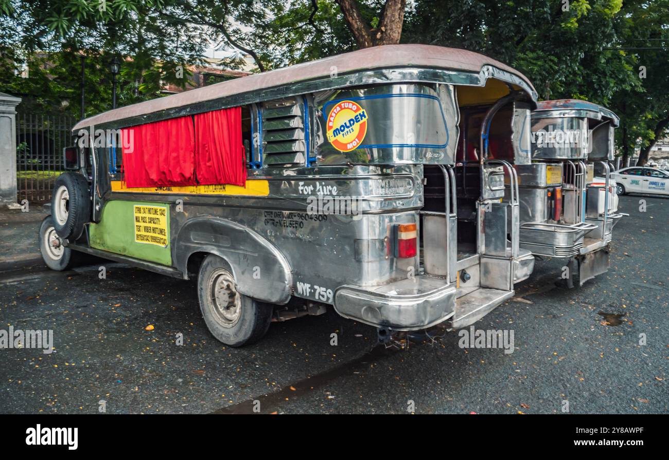 Manila, Philippines - August 25, 2019: Colorful jeepneys parked along a ...