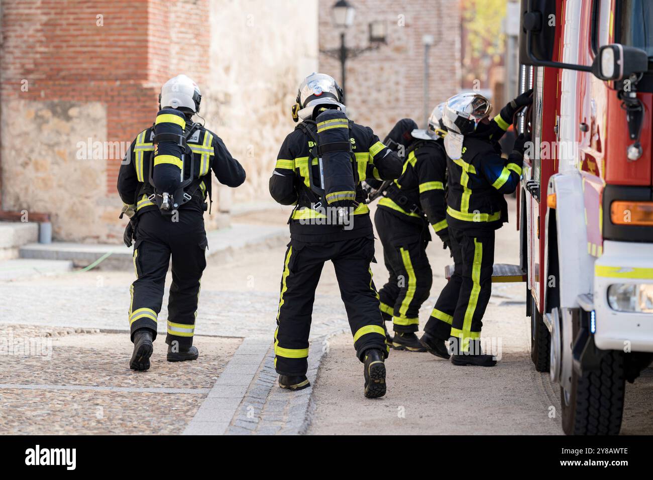 Firefighters during a fire drill at the church of Santa Catalina de ...