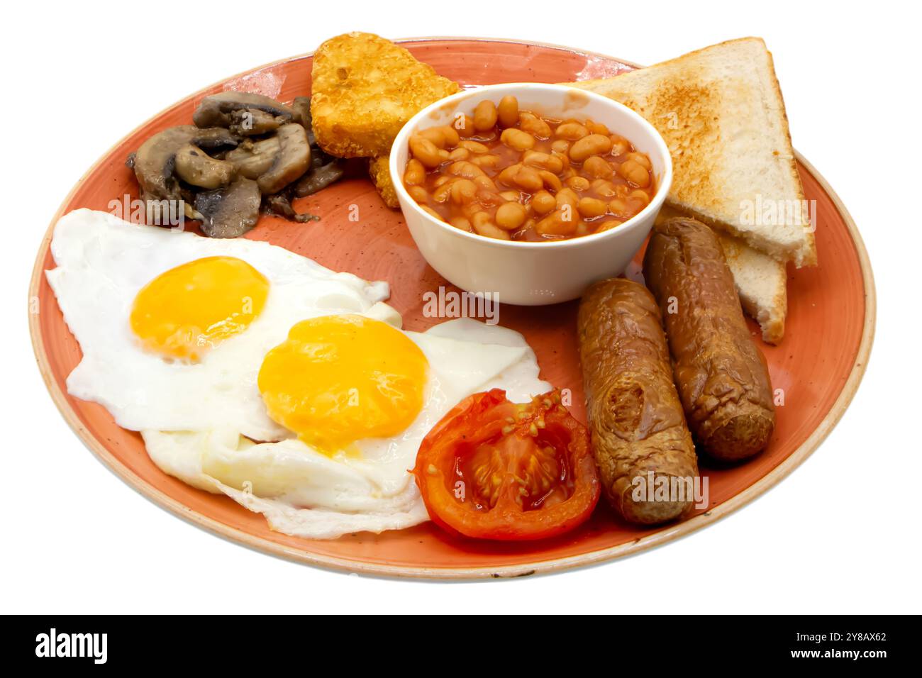 Traditional full English breakfast with fried eggs, sausages, beans ...