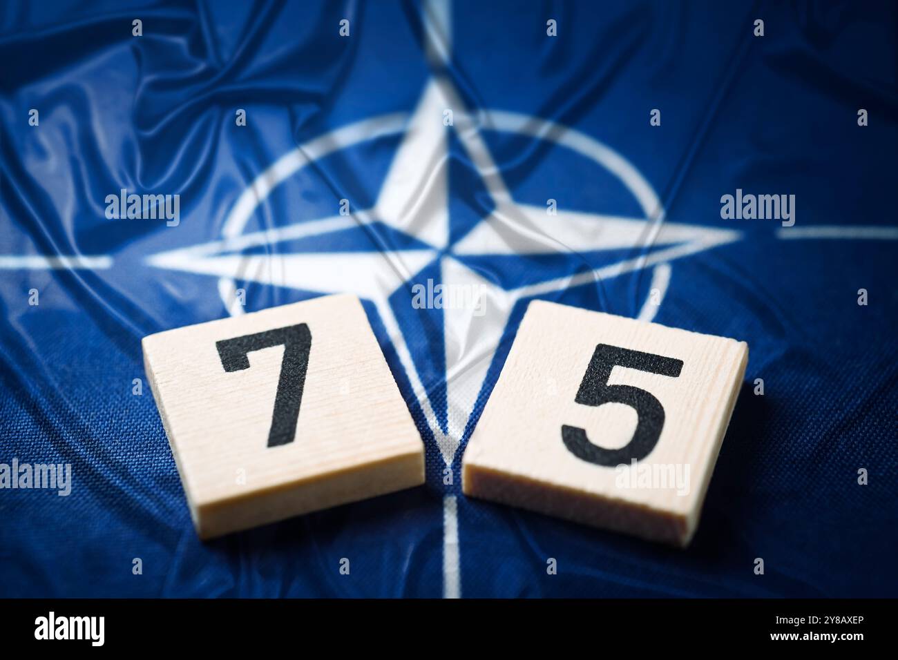 PHOTO MONTAGE, NATO flag with the number 75, symbolic photo of the ...