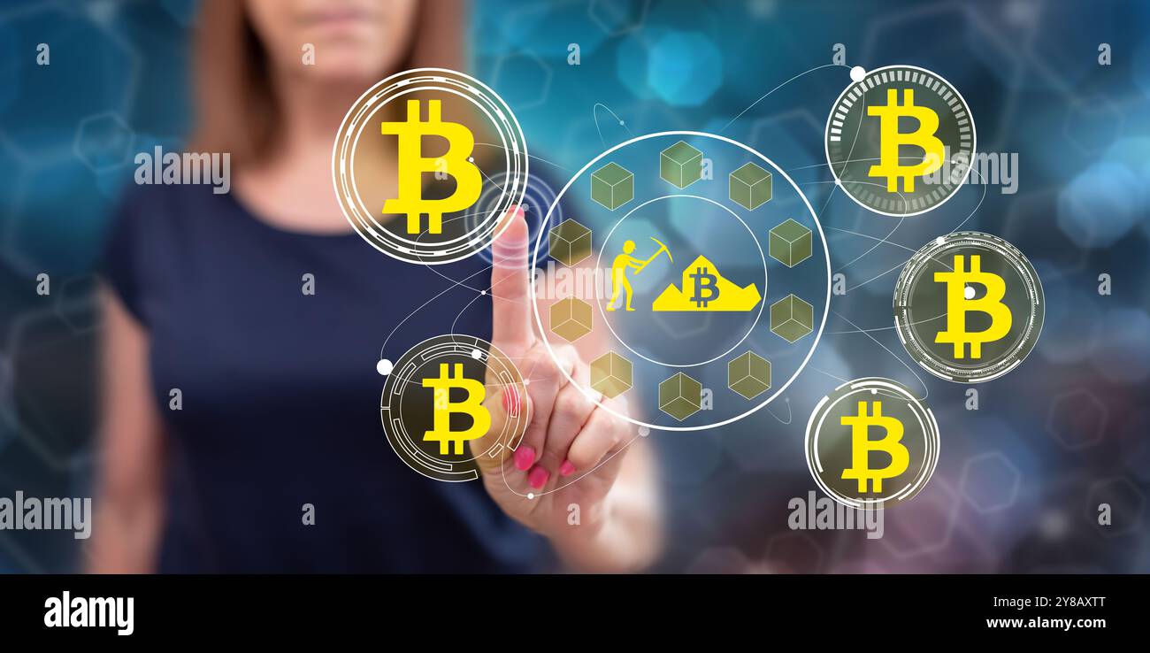 Woman touching a bitcoin mining concept on a touch screen with her ...