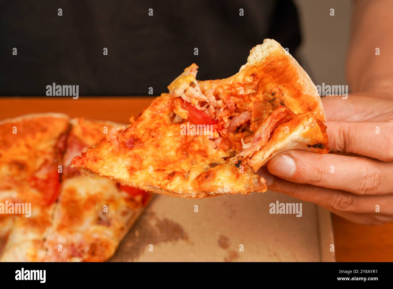 Eating pizza. Fast food order. Restaurant advertising. Delicious cheesy ...