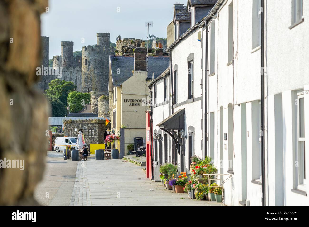 Conwy Wales - July 30 2024; White building facades along Lower Gate ...