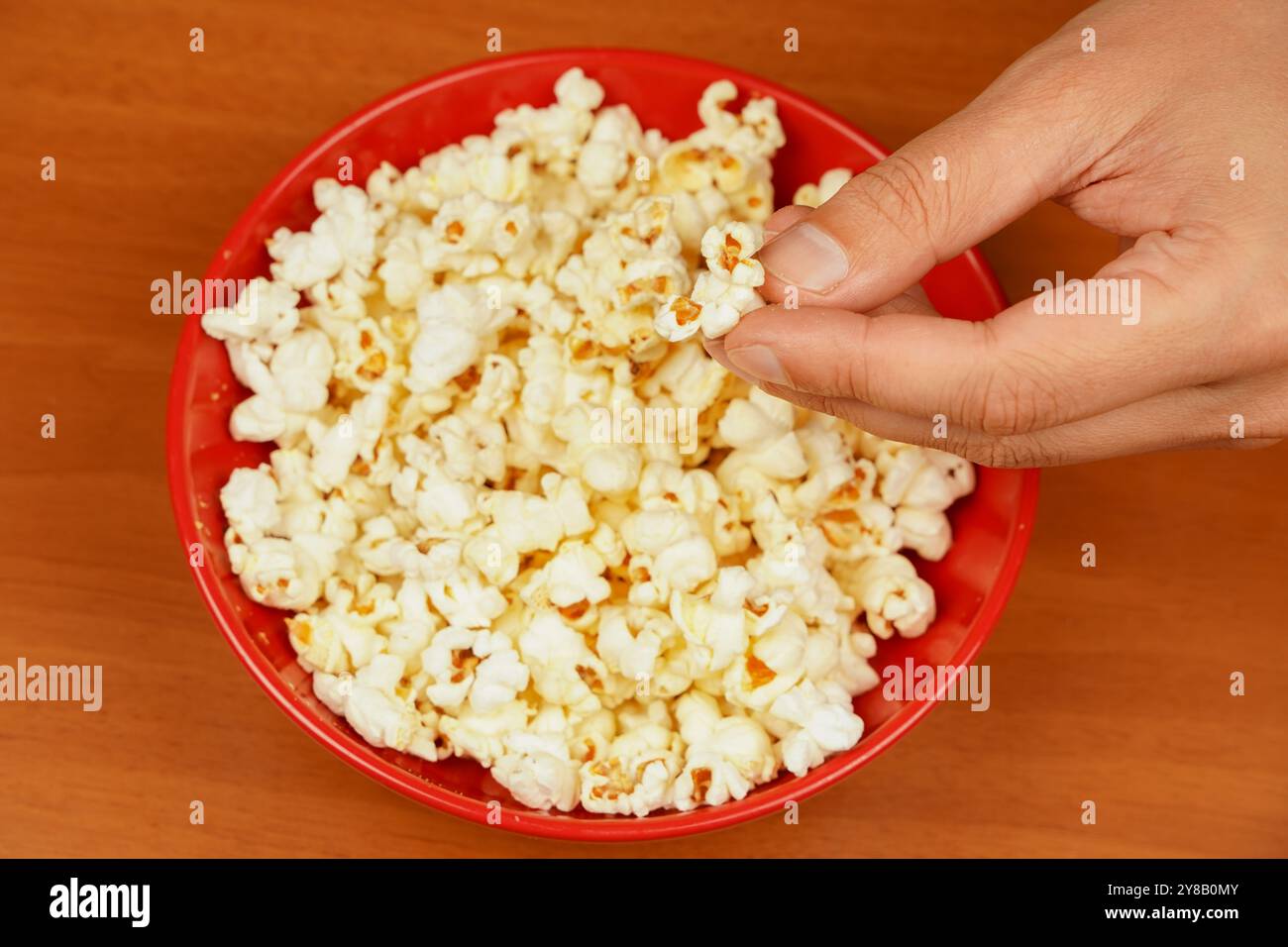 Delicious snack to eat in the cinema. Salted popcorn. Popcorn. Fast ...