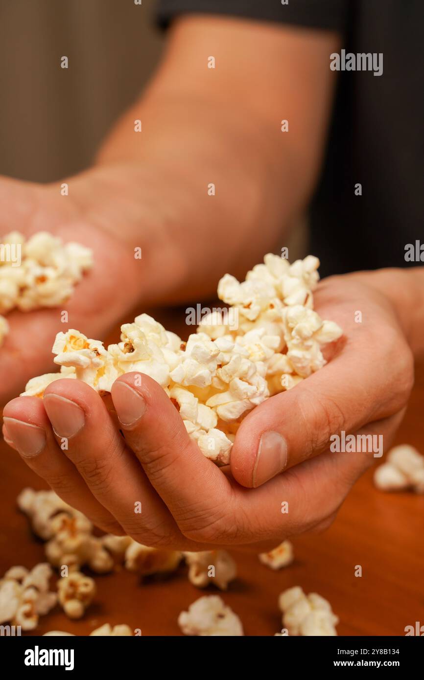 Salted popcorn. Popcorn. Fast food. Junk food. Snack for cinema ...
