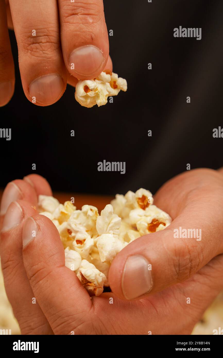 Delicious snack to eat in the cinema. Salted popcorn. Popcorn. Fast ...