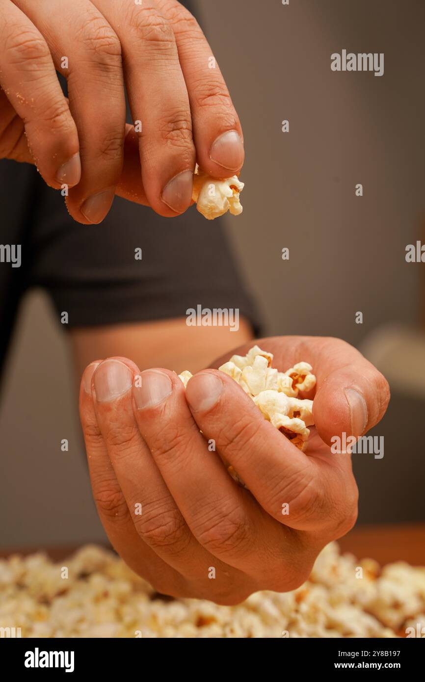 Delicious snack to eat in the cinema. Salted popcorn. Popcorn. Fast ...