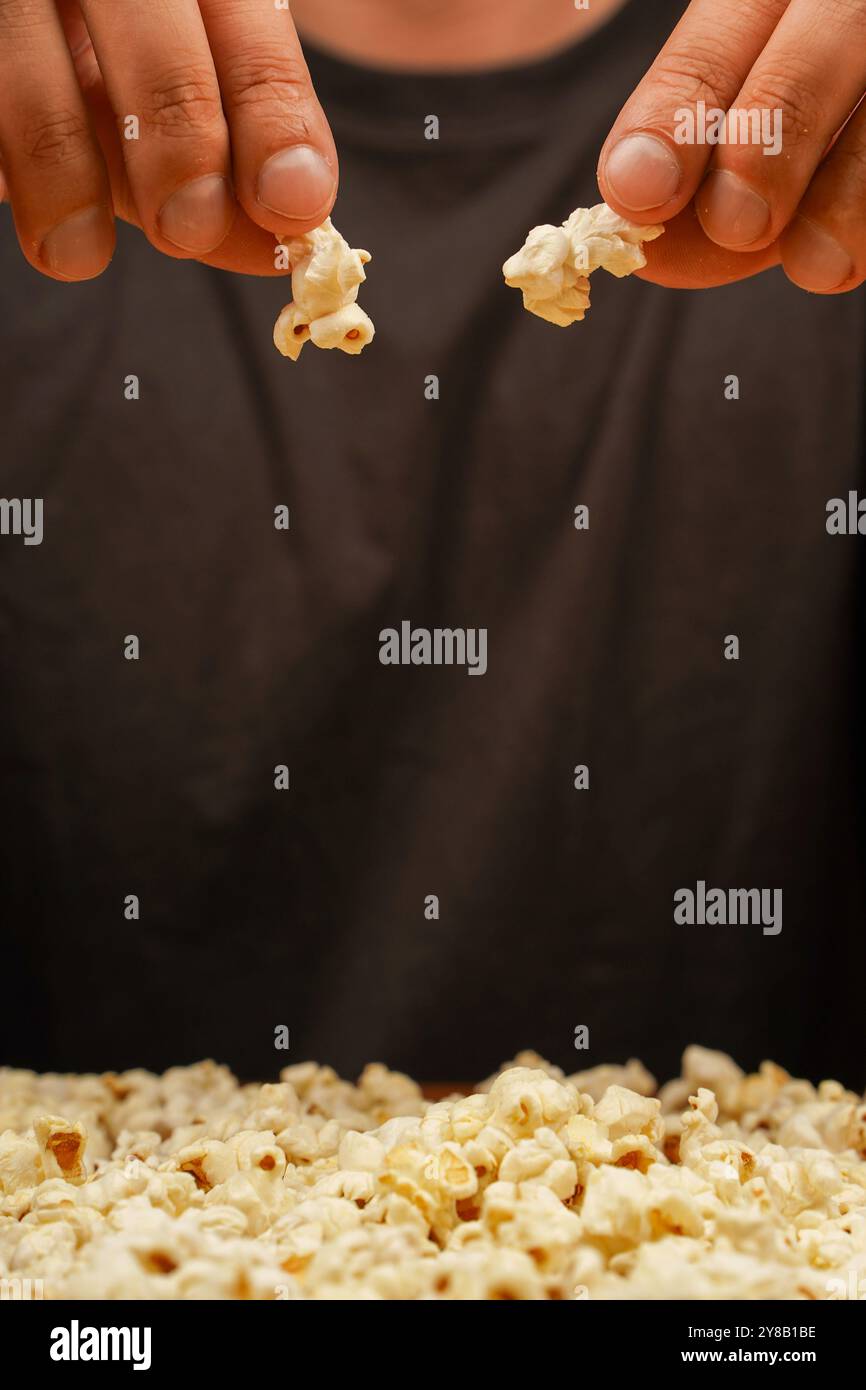 Delicious snack to eat in the cinema. Salted popcorn. Popcorn. Fast ...