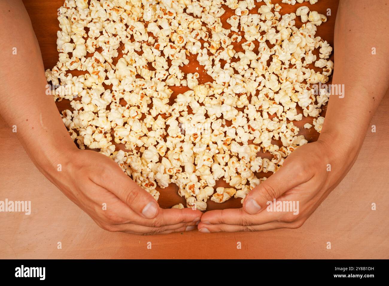 Delicious snack to eat in the cinema. Salted popcorn. Popcorn. Fast ...