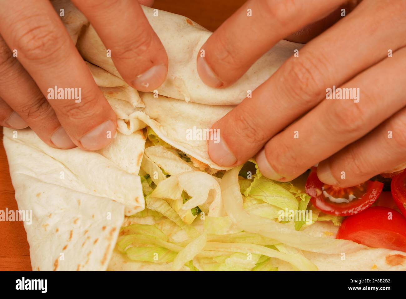Fast food. Junk food. Eating. Food. Delicious. Preparing chicken roll ...