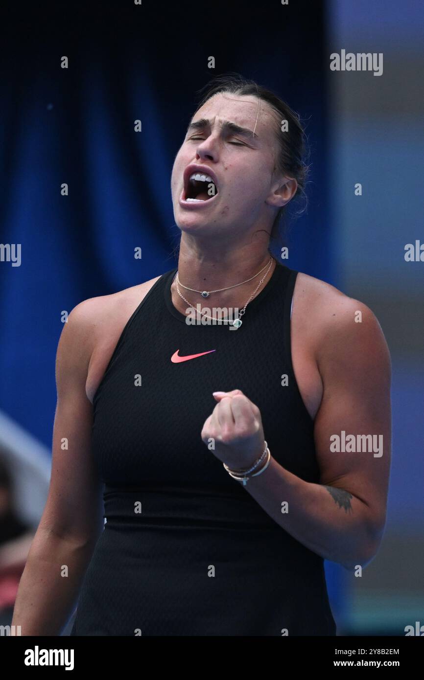 Beijing, China. 4th Oct, 2024. Aryna Sabalenka celebrates scoring ...